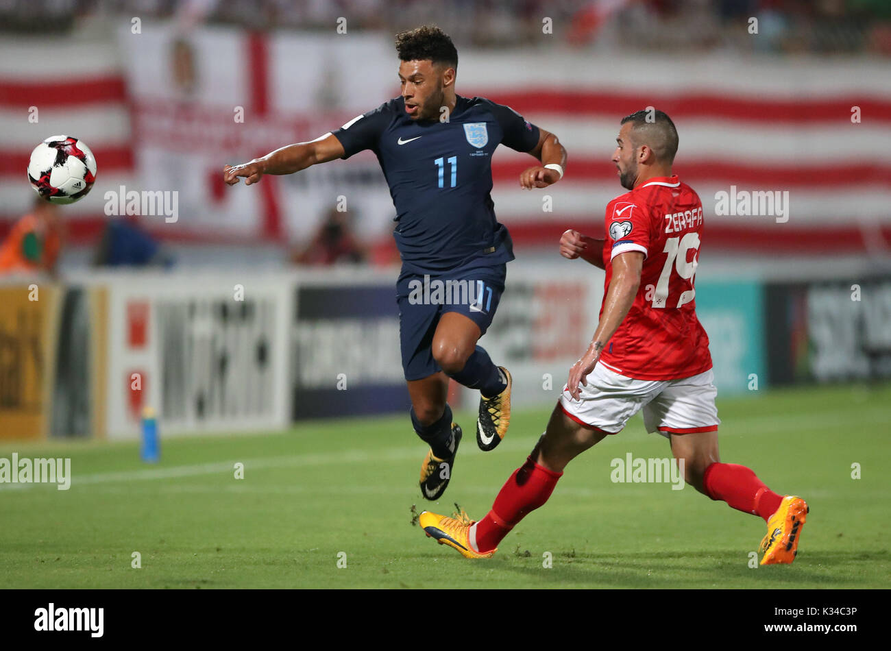 England's Alex Oxlade-Chamberlain and Malta's Joe Zerafa (right) battle ...