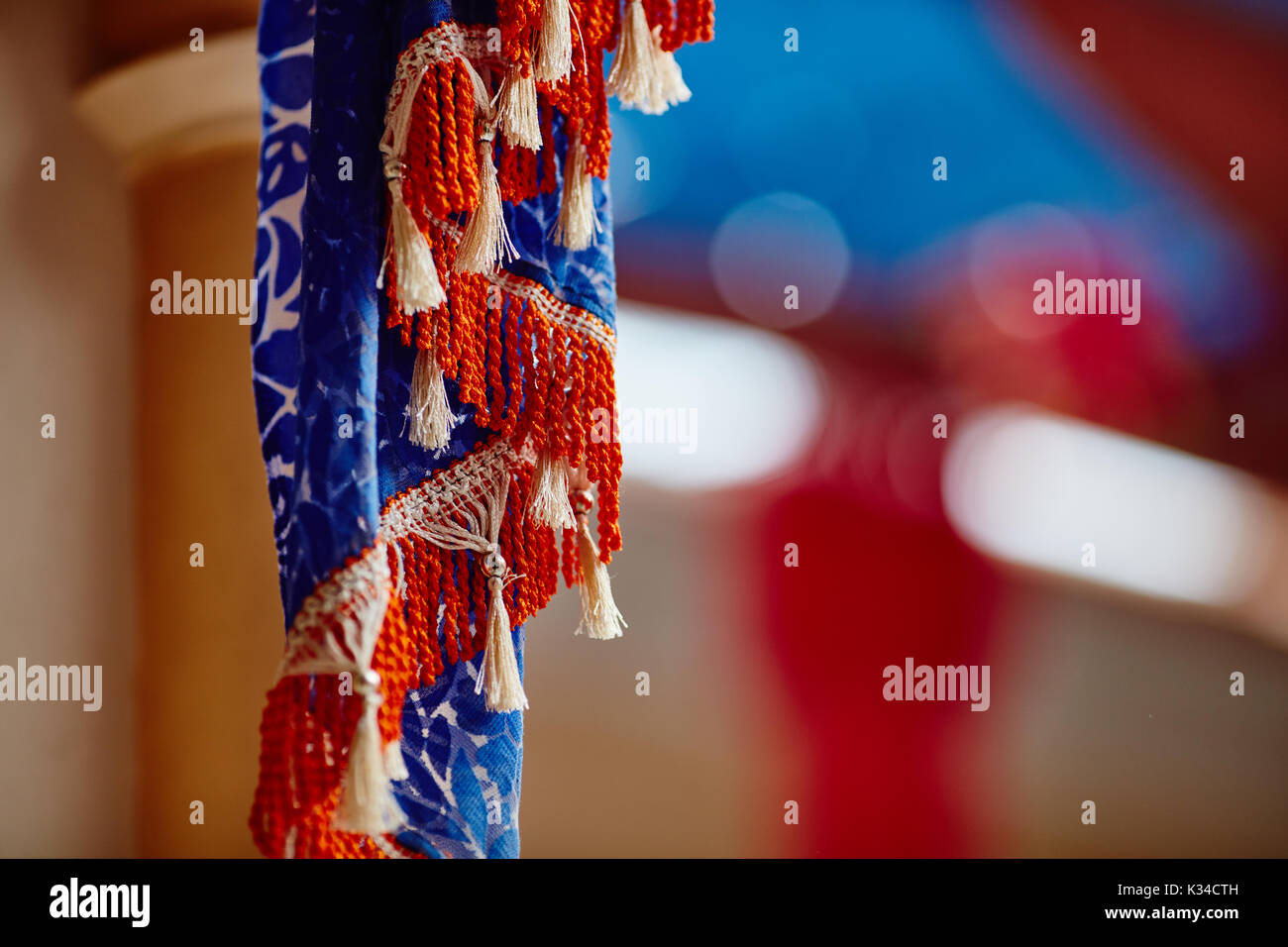 Textile decorations hanging inside Indian temple macro Stock Photo - Alamy