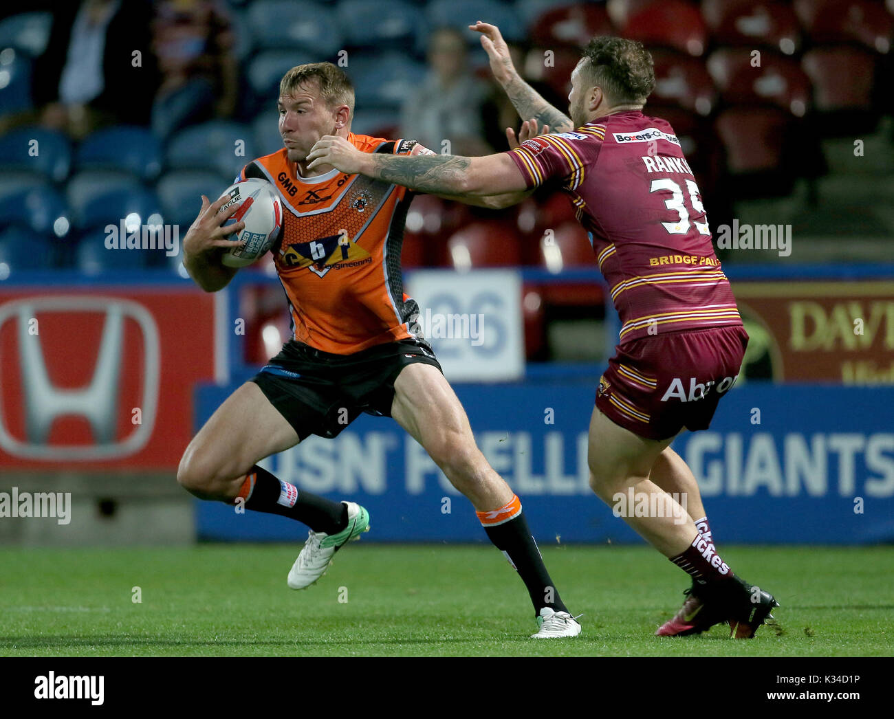 Castleford Tigers Michael Shenton and Huddersfield Giants Jordan Rankin ...