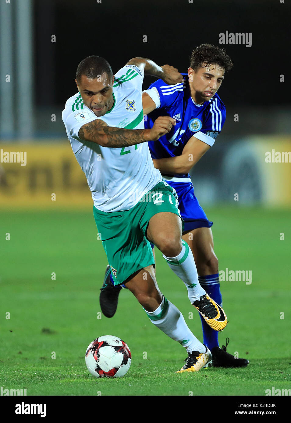 Northern Ireland's Josh Magennis (left) and San Marino's Michael ...