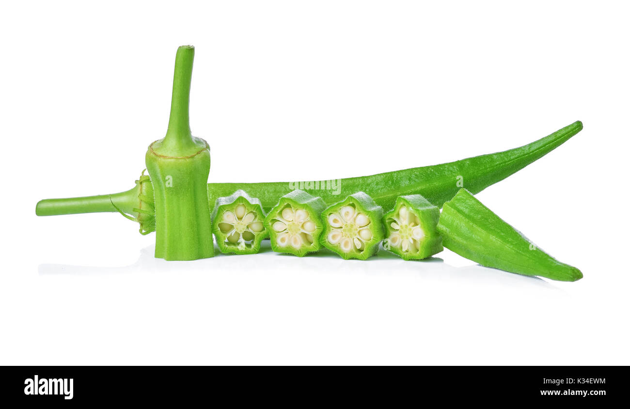 Okras on white background Stock Photo - Alamy