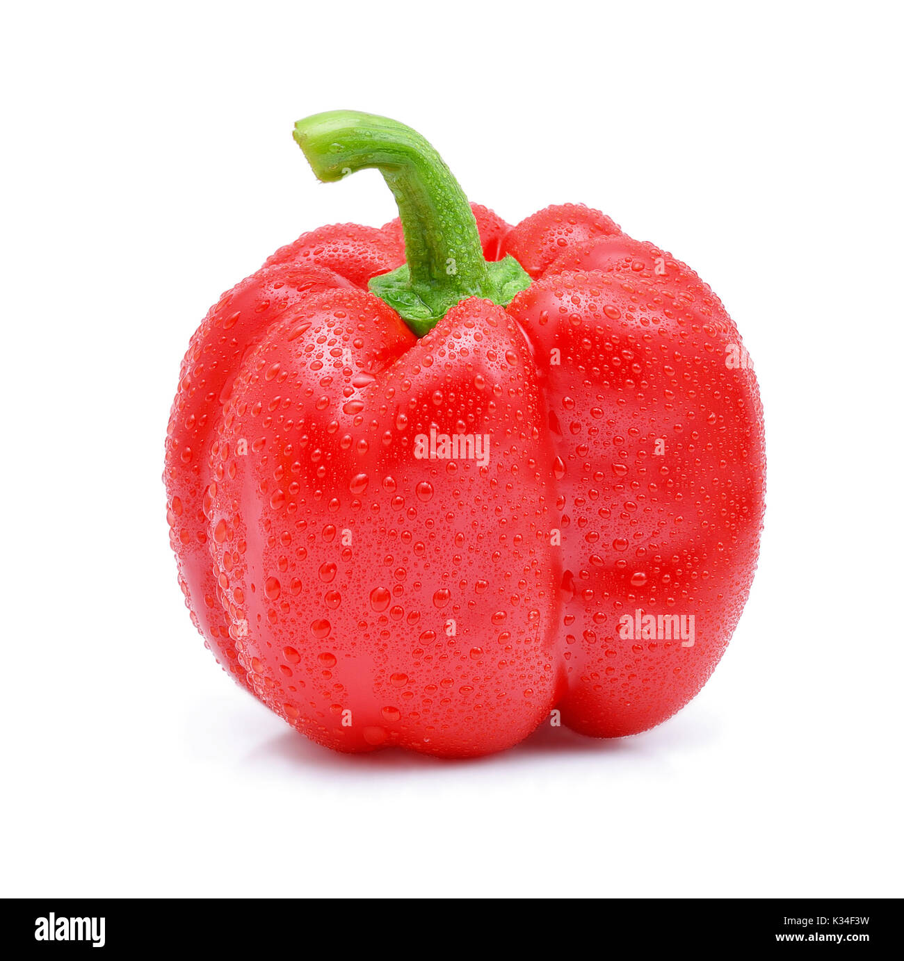 sweet pepper with drops of water on white background Stock Photo - Alamy