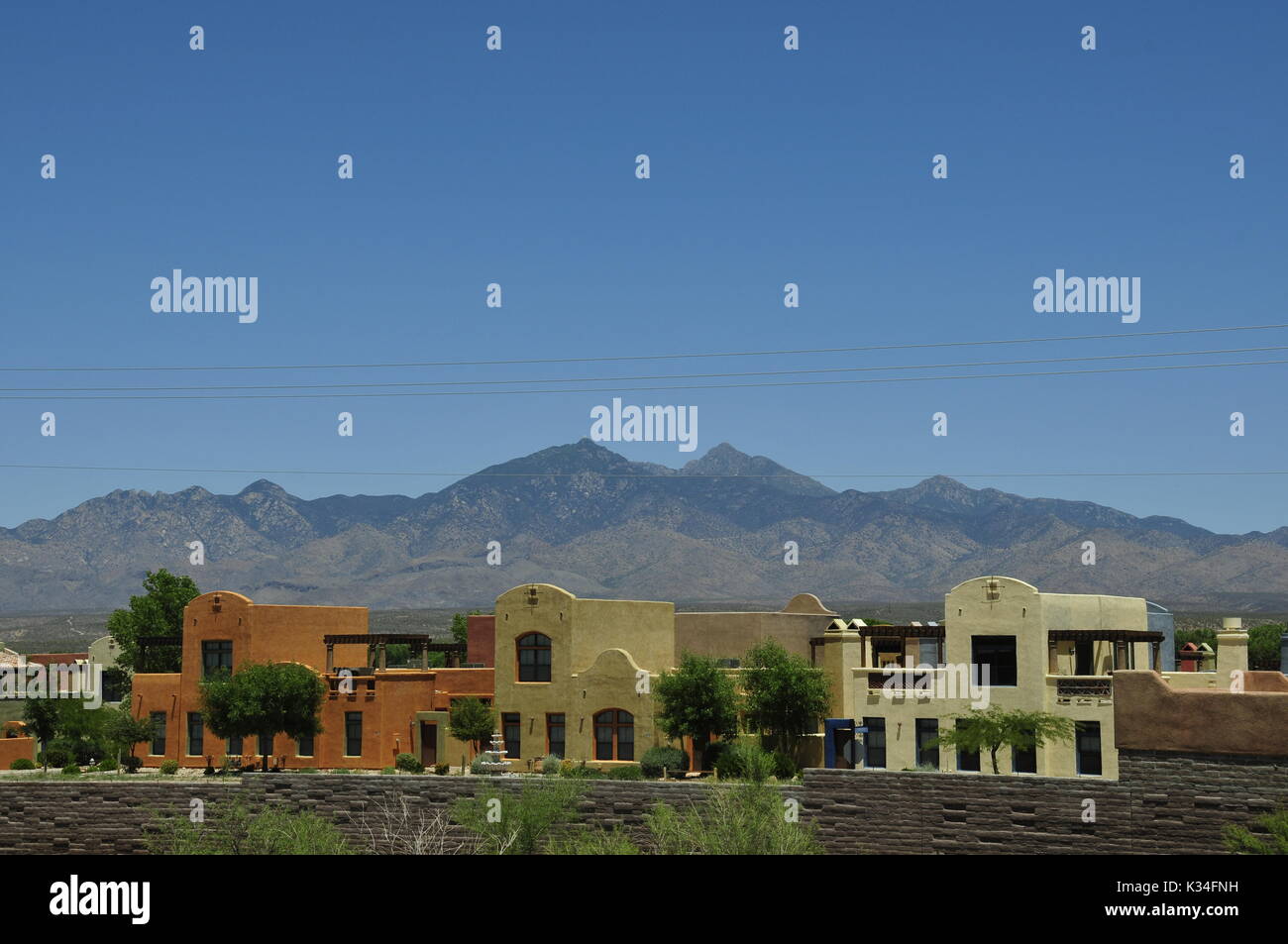 Housing in an artist community with a backdrop of the Santa Rita ...