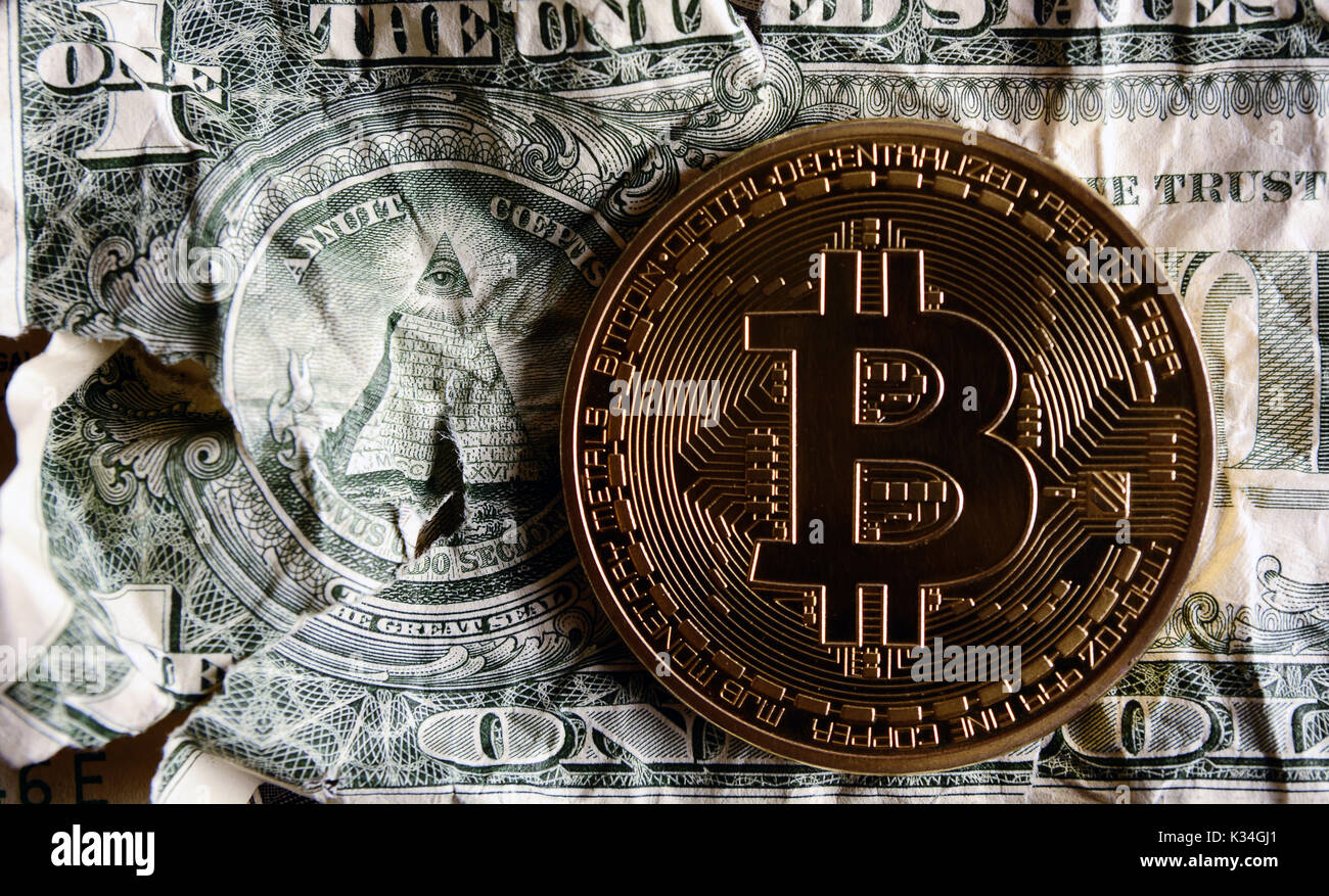 Bitcoin on Crushed dollar banknote.Concept of Monetary system collapse ...