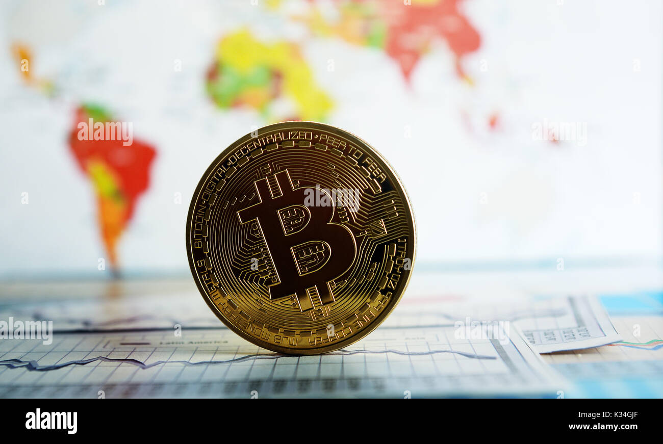 Bitcoin currency on a world map background Stock Photo - Alamy