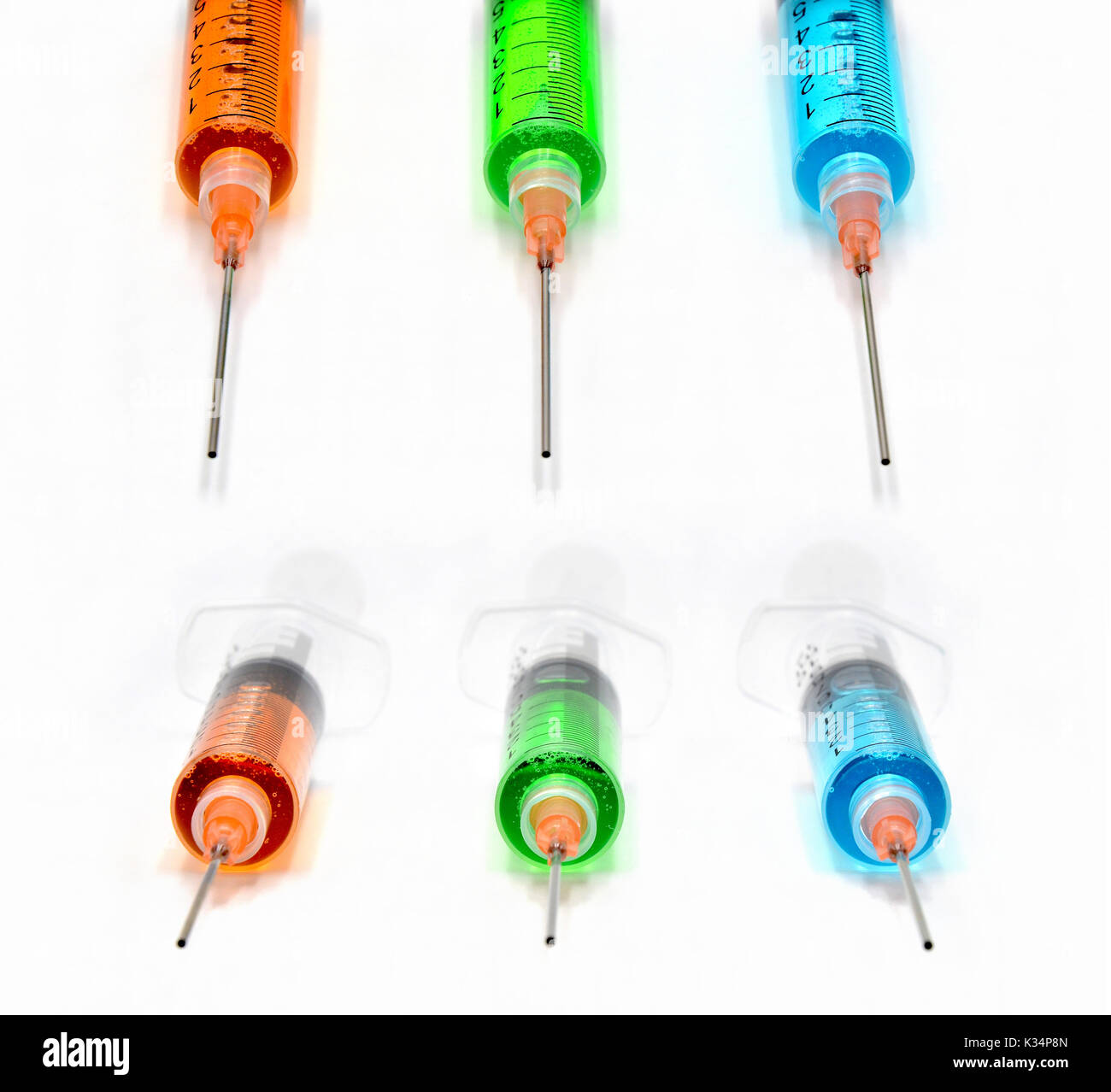Syringe injection on white background Stock Photo - Alamy