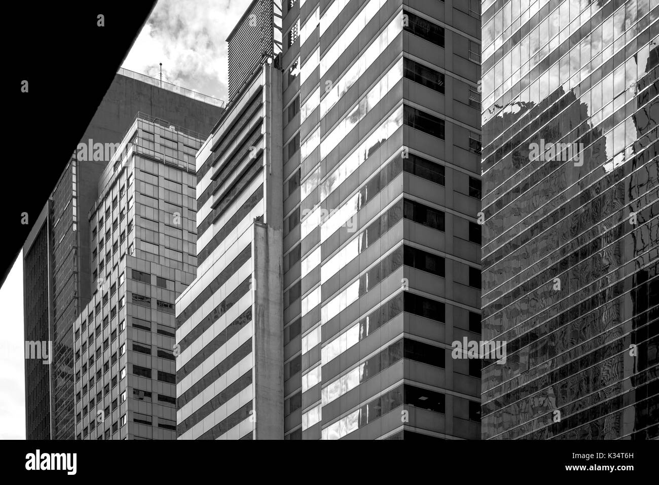 Hong Kong Modern office building with B&W color Stock Photo - Alamy