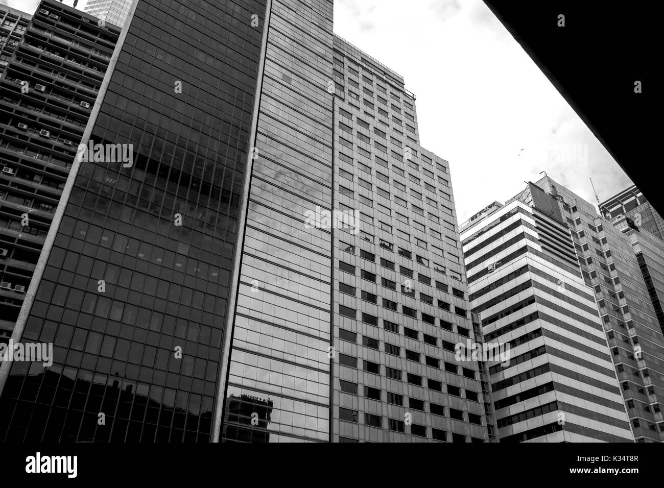 Hong Kong Modern office building with B&W color Stock Photo - Alamy