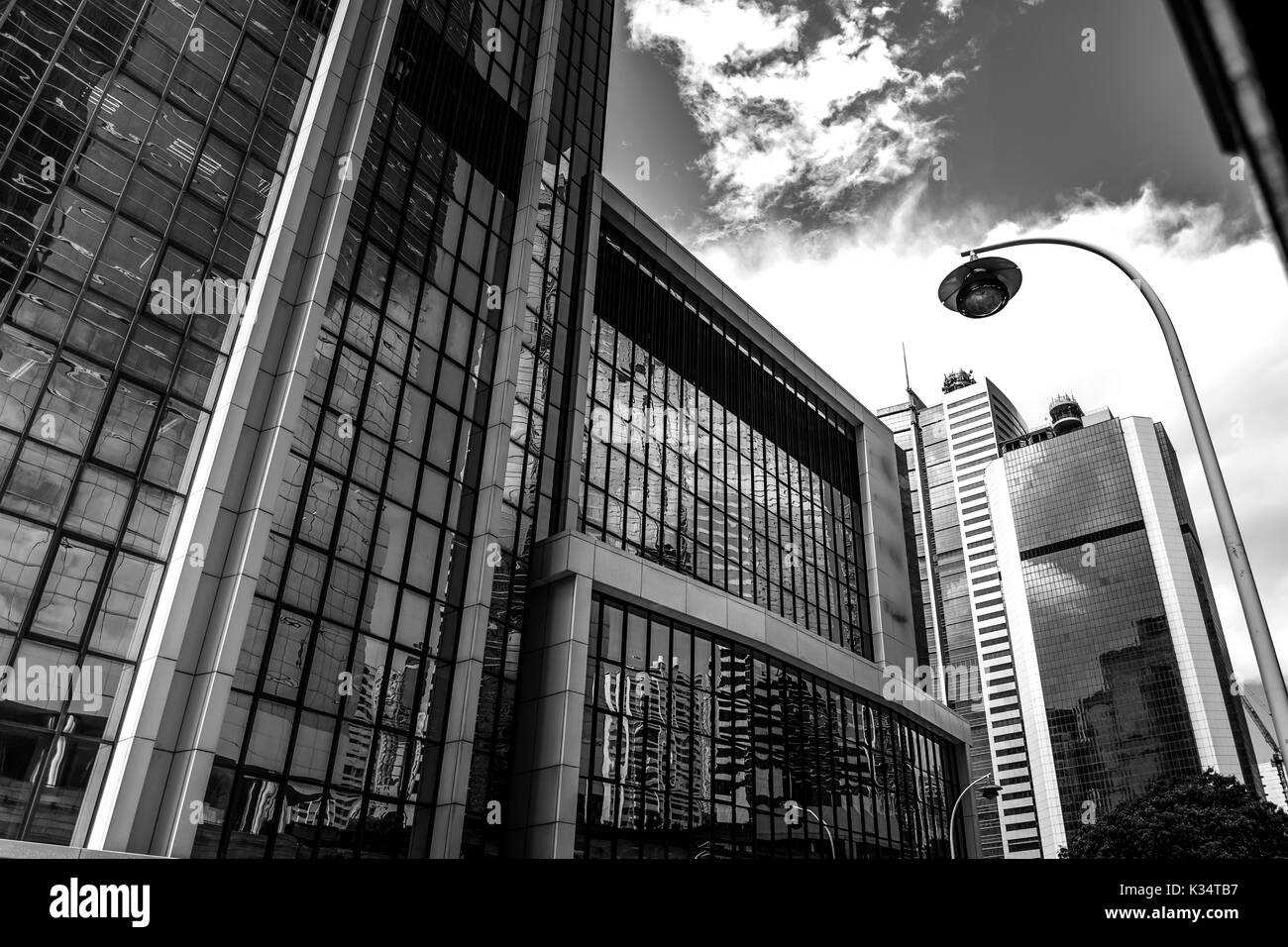 Hong Kong Modern office building with B&W color Stock Photo - Alamy