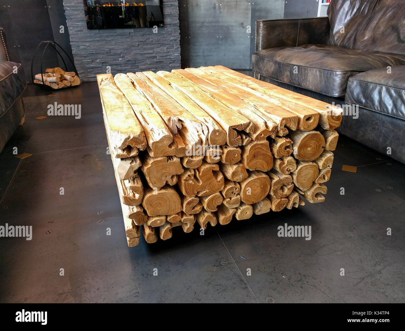 Log table in living room Stock Photo - Alamy