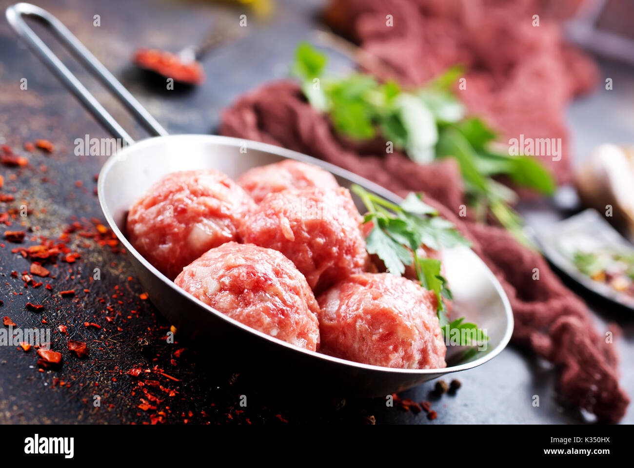 Raw meatballs salt spice hi-res stock photography and images - Alamy