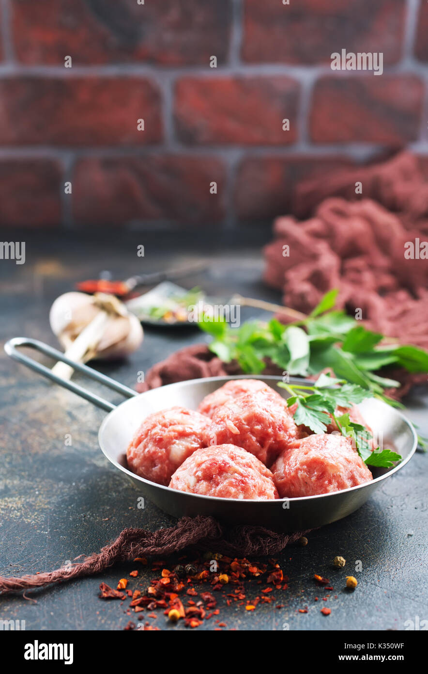 Raw meatballs salt spice hi-res stock photography and images - Alamy