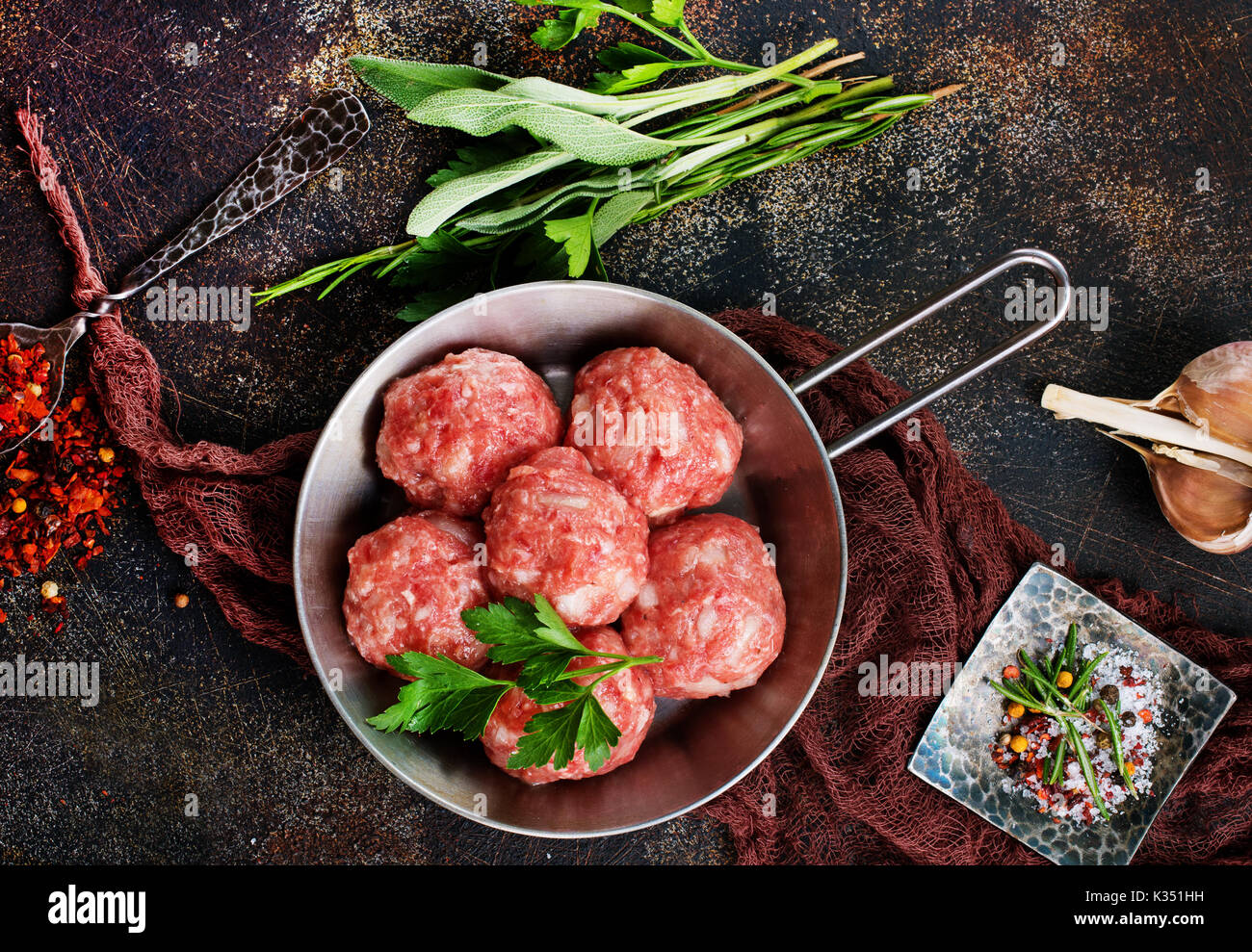 Raw meatballs salt spice hi-res stock photography and images - Alamy