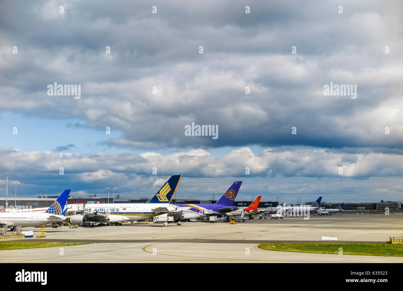 Passenger aircraft parked in London Heathrow Airport on stands at ...