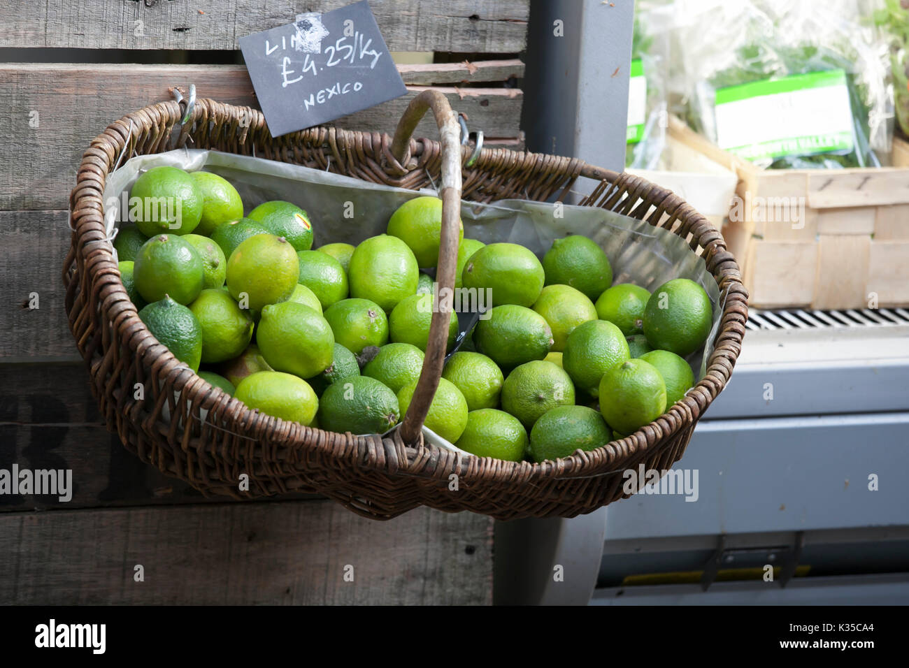 Lime in a wicker box that hangs on the wall, for sale on the market ...