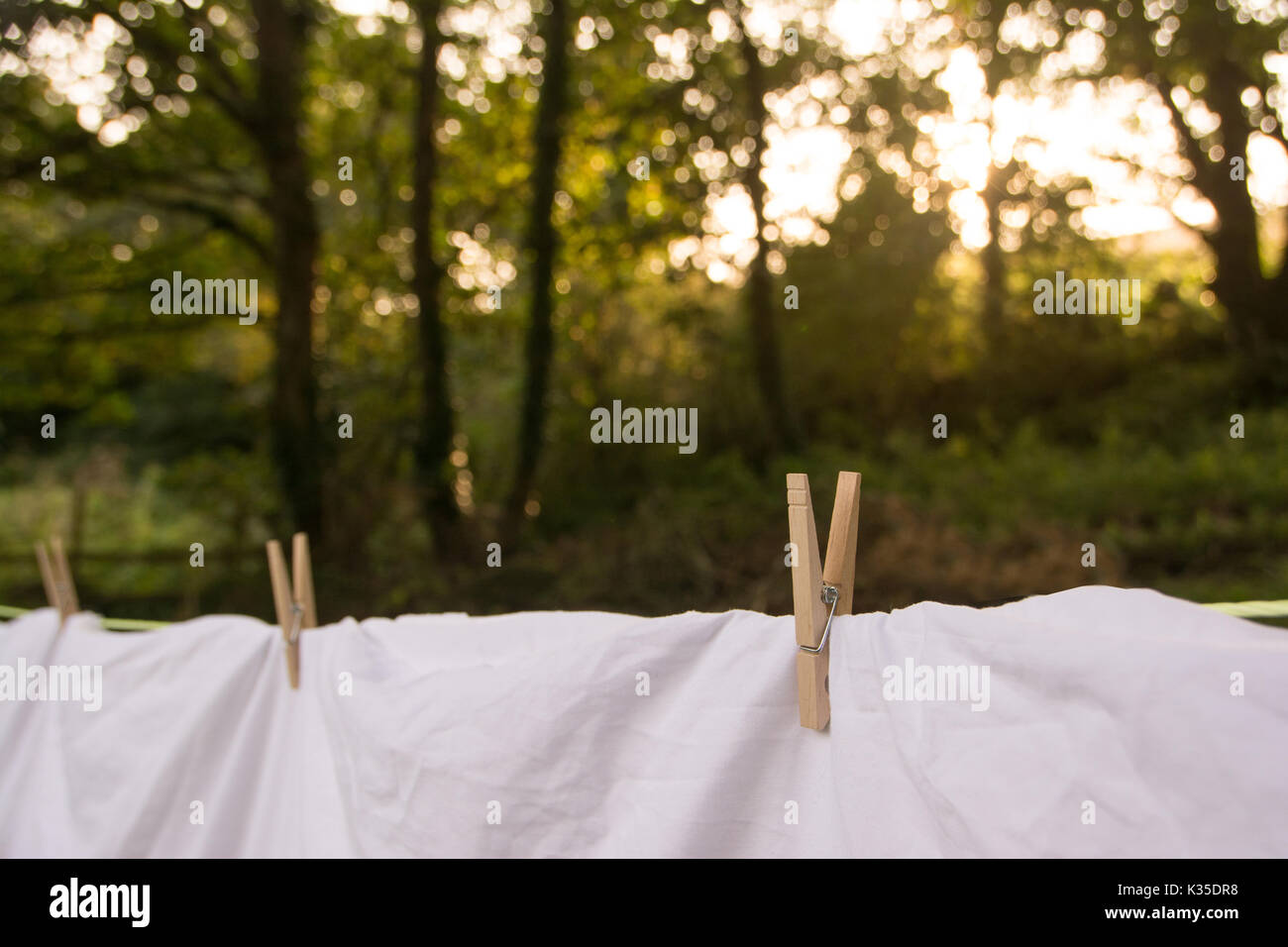 Washing line at sunset in a lovely environment Stock Photo - Alamy