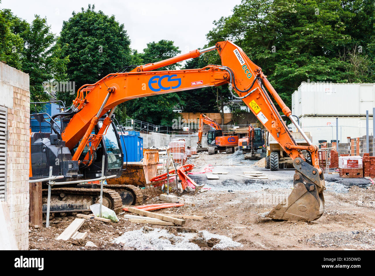 Orange earthmover, redevelopment of old Ashmount School site, Islington ...