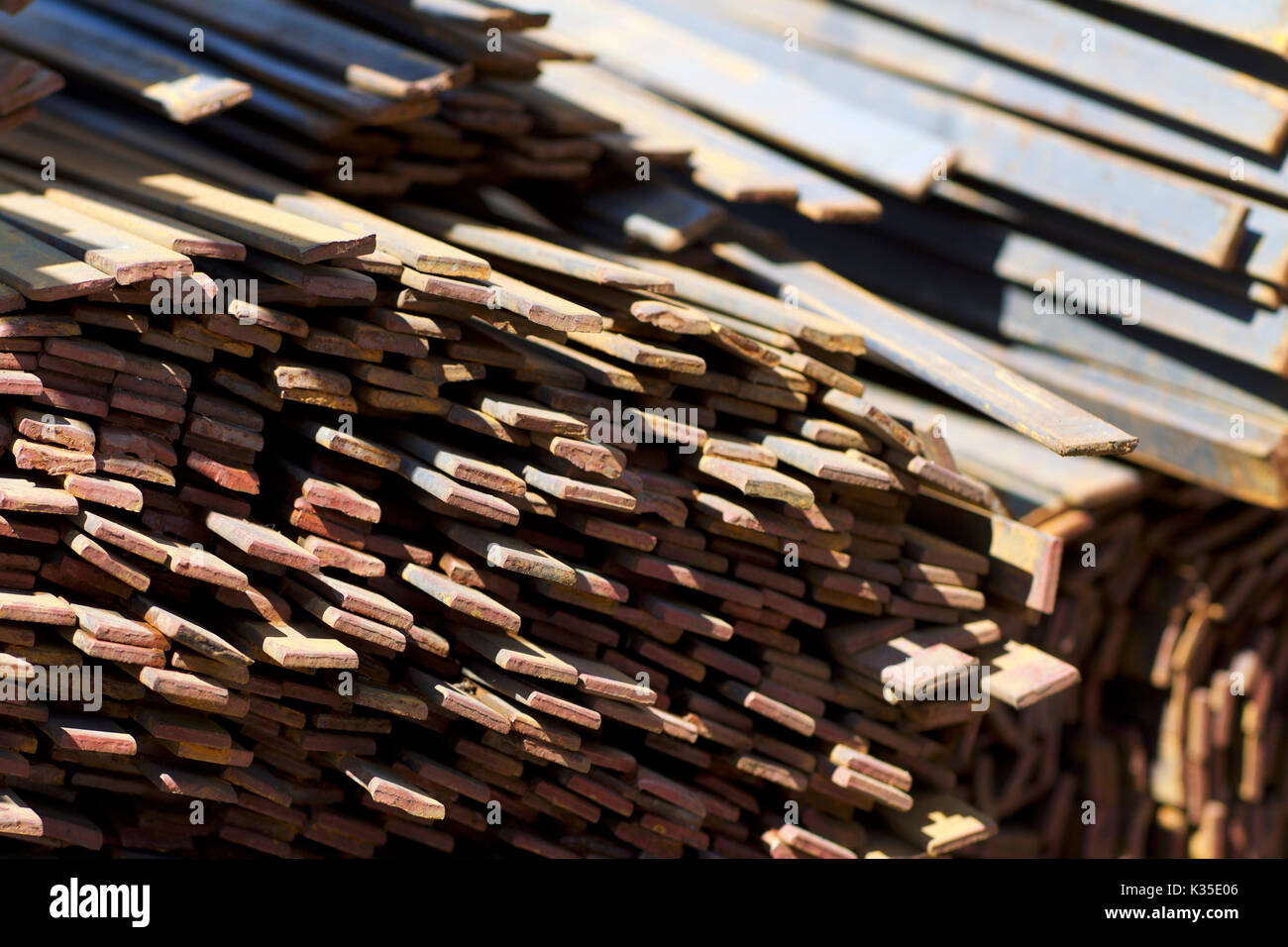 Metal profile strip in packs at the warehouse of metal products, Russia ...