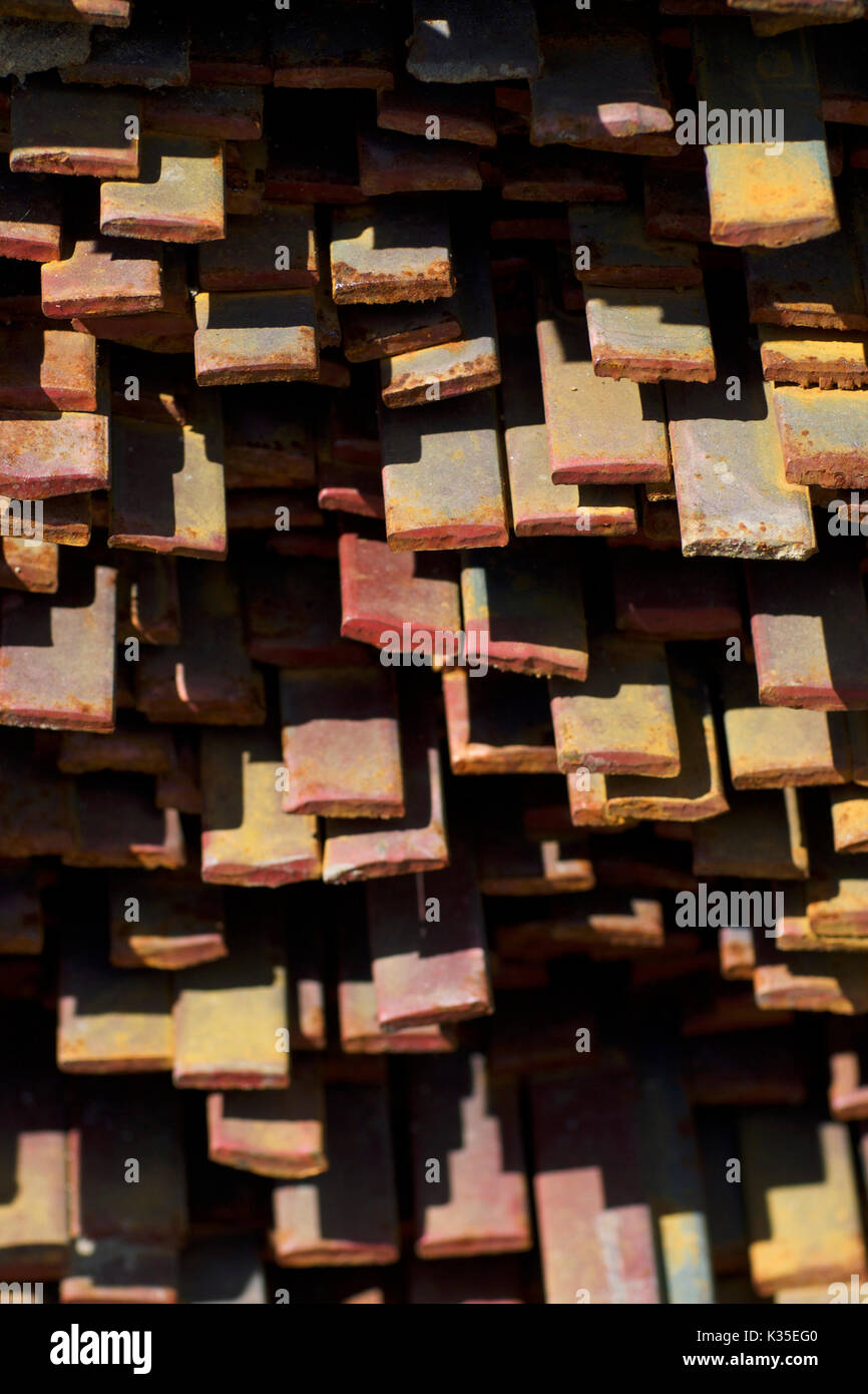 Metal profile strip in packs at the warehouse of metal products, Russia ...