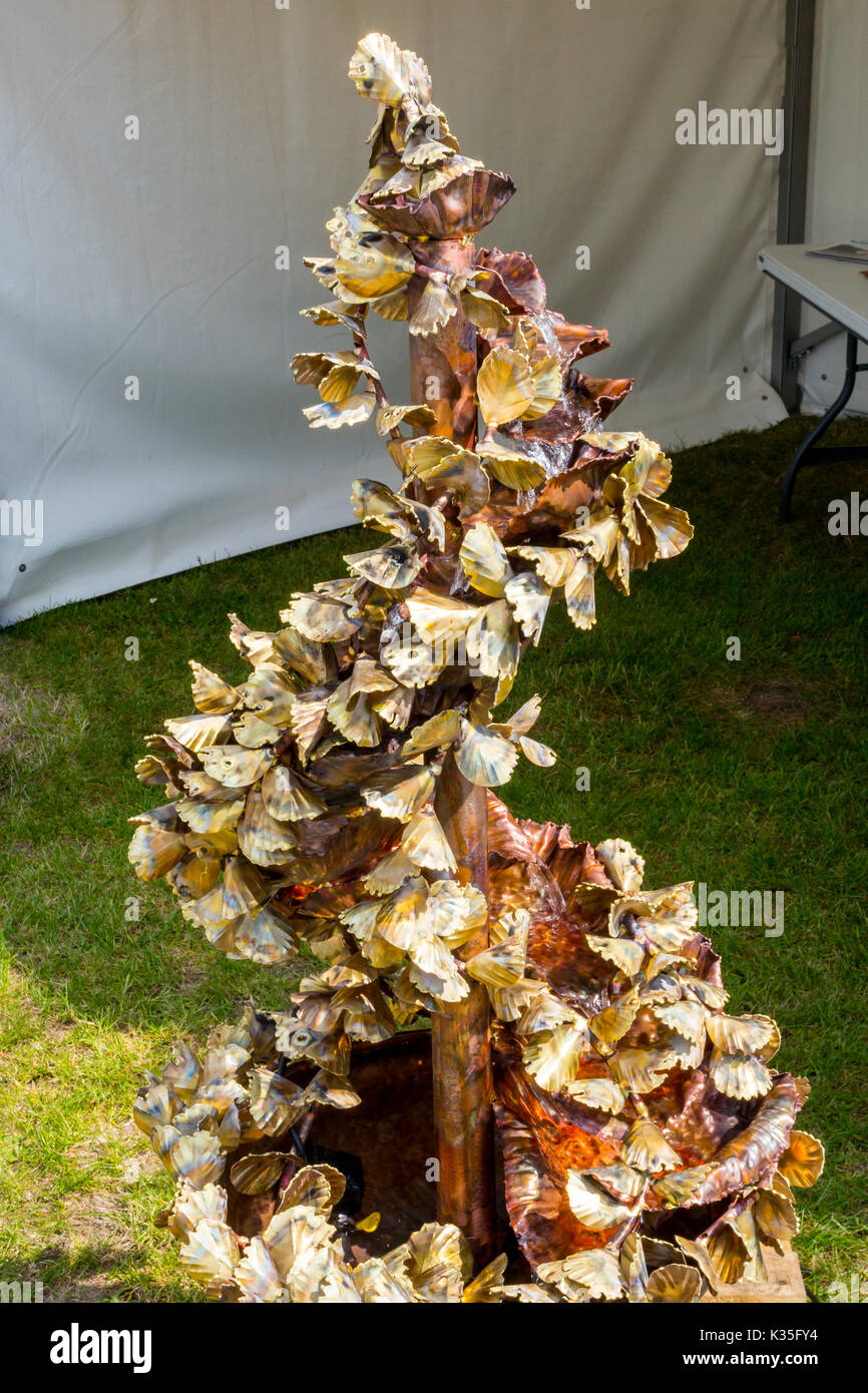 An attractive an innovative leaf design copper water feature at the ...