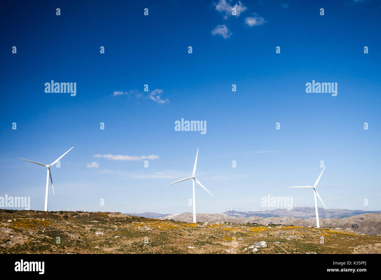 Three Windmills in the mountain Stock Photo - Alamy