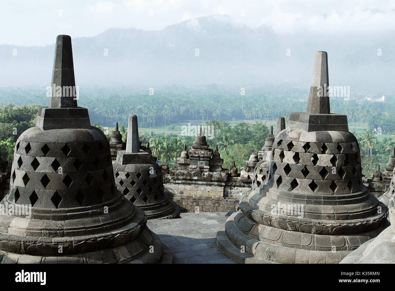 Morning top view from the buddhist temple Borobudur looking over a ...