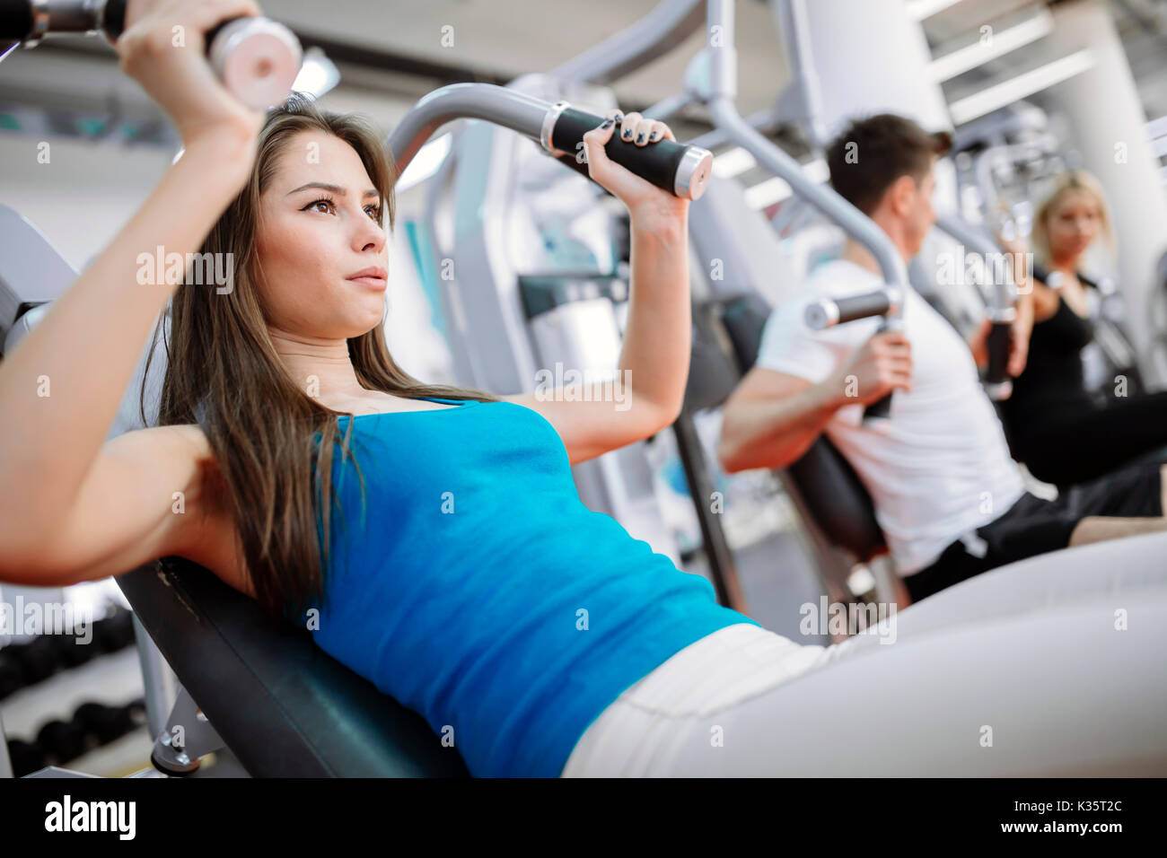 People exercising in gym Stock Photo - Alamy