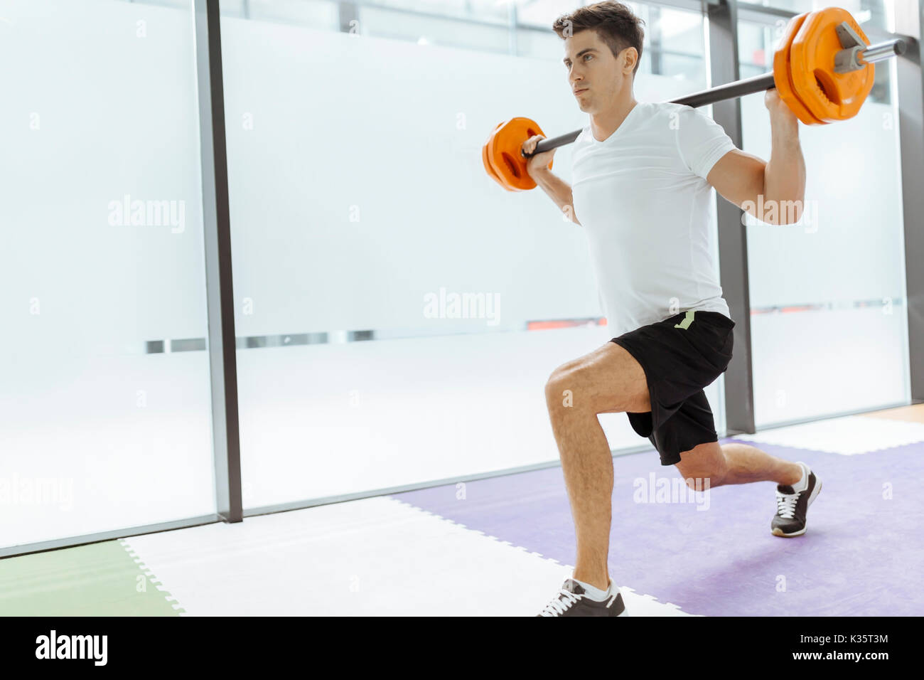 Man lifting weights energy hi-res stock photography and images - Alamy
