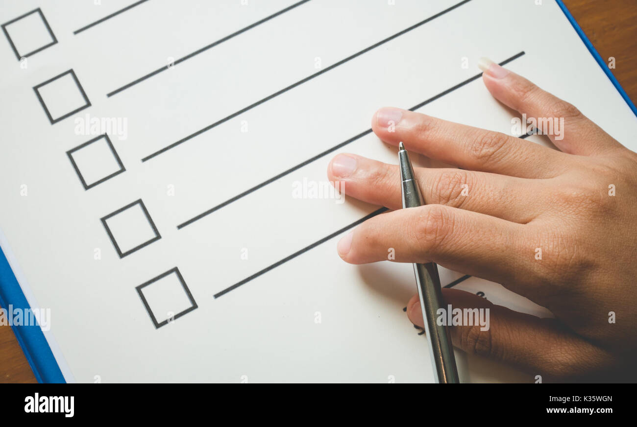 Check list woman hi-res stock photography and images - Alamy