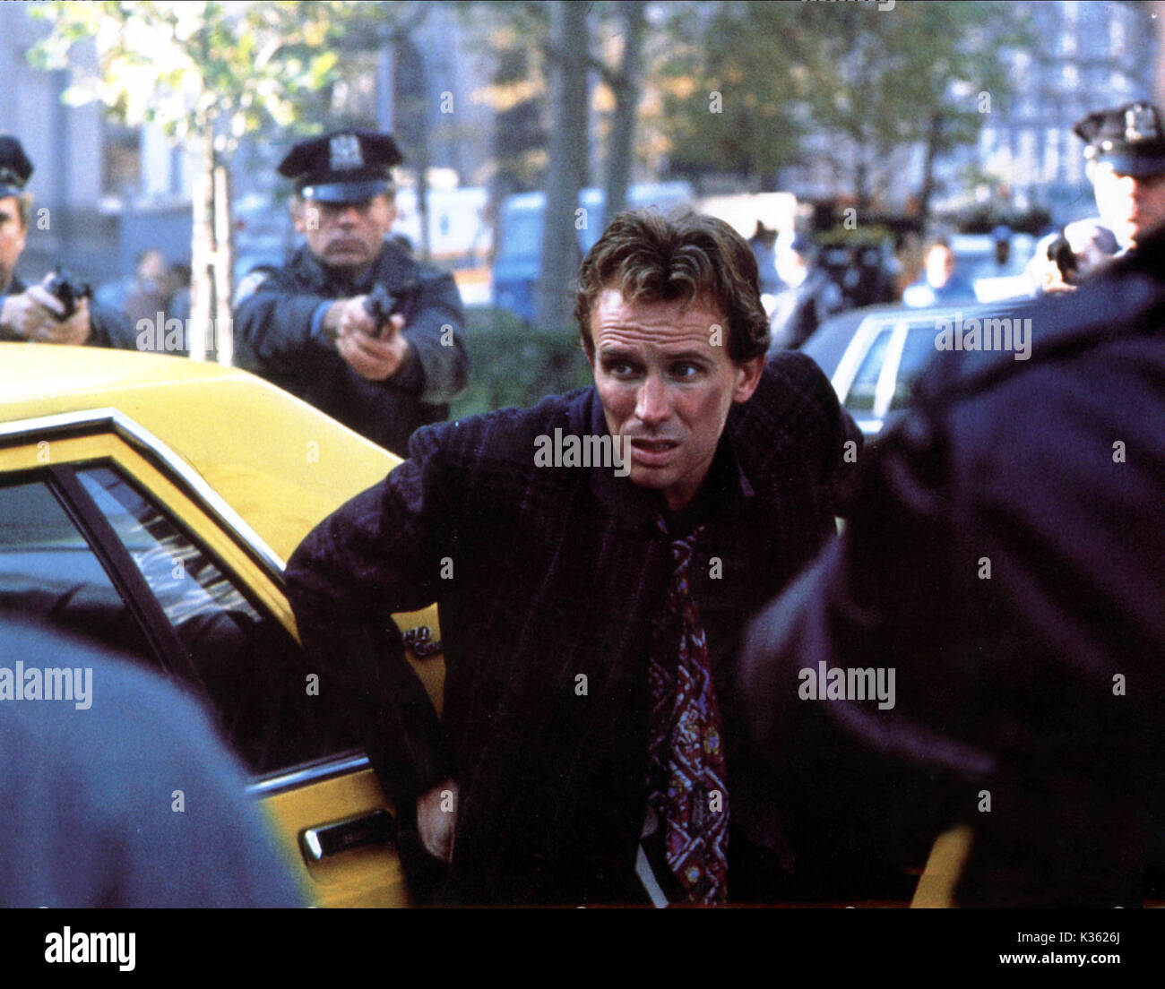SHAKEDOWN aka BLUE JEAN COP PETER WELLER Date: 1988 Stock Photo - Alamy