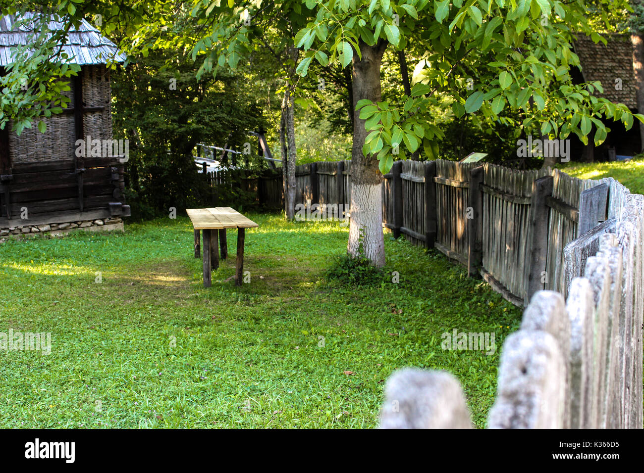 Rustic traditional wooden fence and house from Romania Stock Photo - Alamy