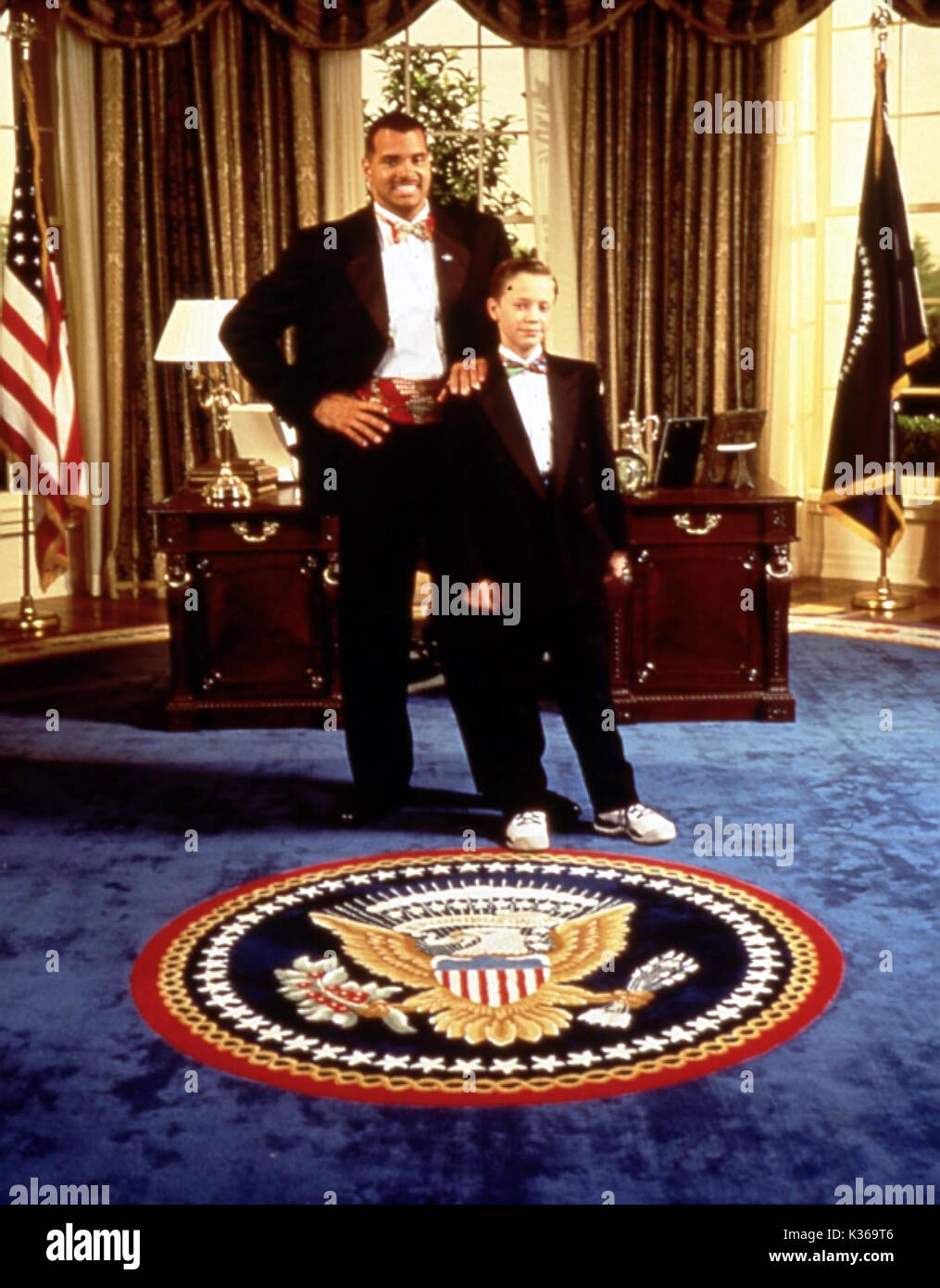 FIRST KID BROCK PIERCE, SINBAD Date: 1997 Stock Photo - Alamy