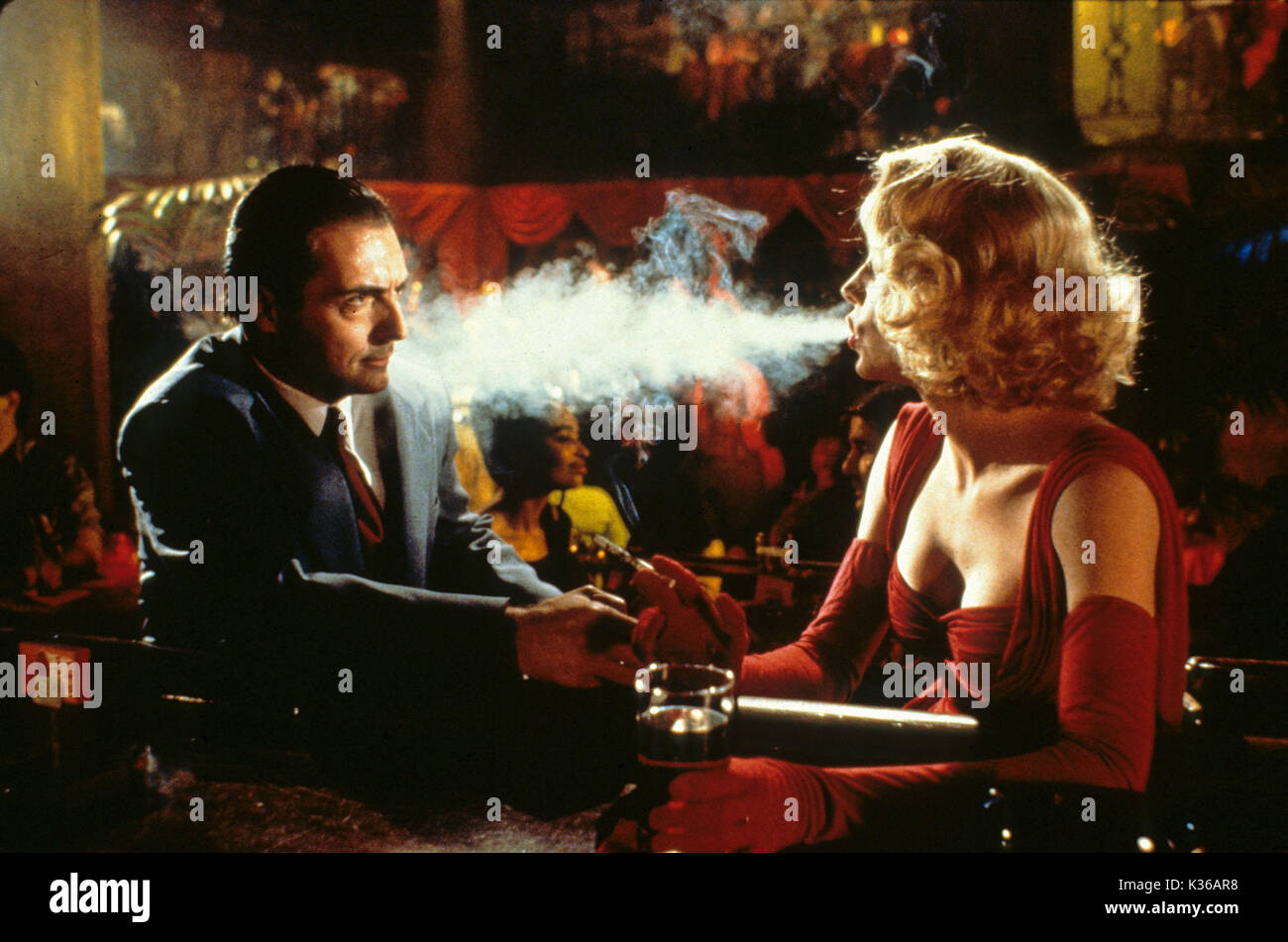 FATAL INSTINCT ARMAND ASSANTE, SHERILYN FENN SMOKING WOMAN FATAL INSTINCT ARMAND ASSANTE ...