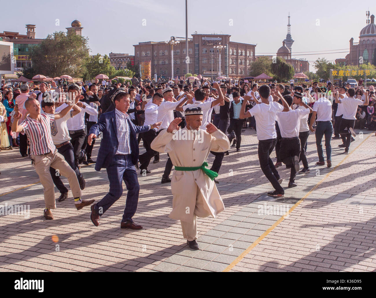 Kashgar, China's Xinjiang. 1st Sep, 2017. People dance to observe Eid ...
