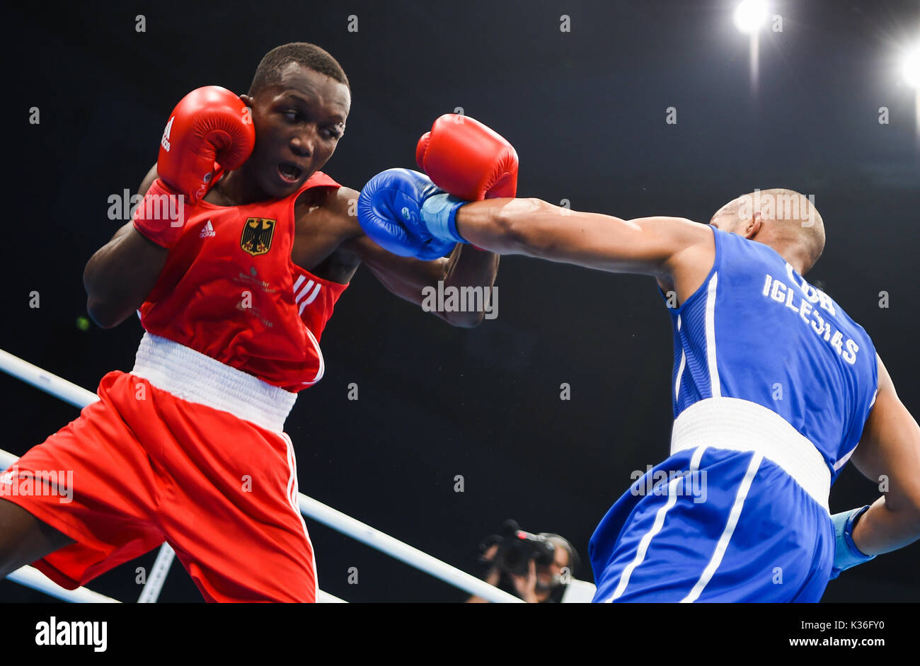 German boxer Abass Baraou (L) fights Roniel Iglesias from Cuba Men's ...