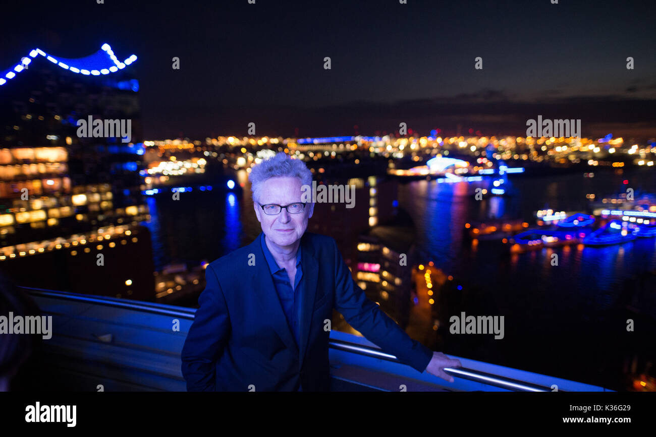 Hamburg, Germany. 01st Sep, 2017. Light artist Michael Batz poses after ...
