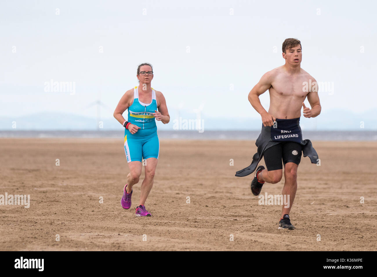 rnli lifeguard sea save rescue rescuer emergency drown drowning water ...