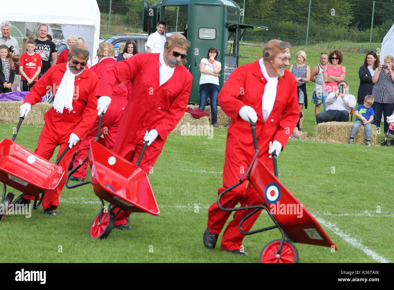 Red and blue uniforms hi-res stock photography and images - Alamy