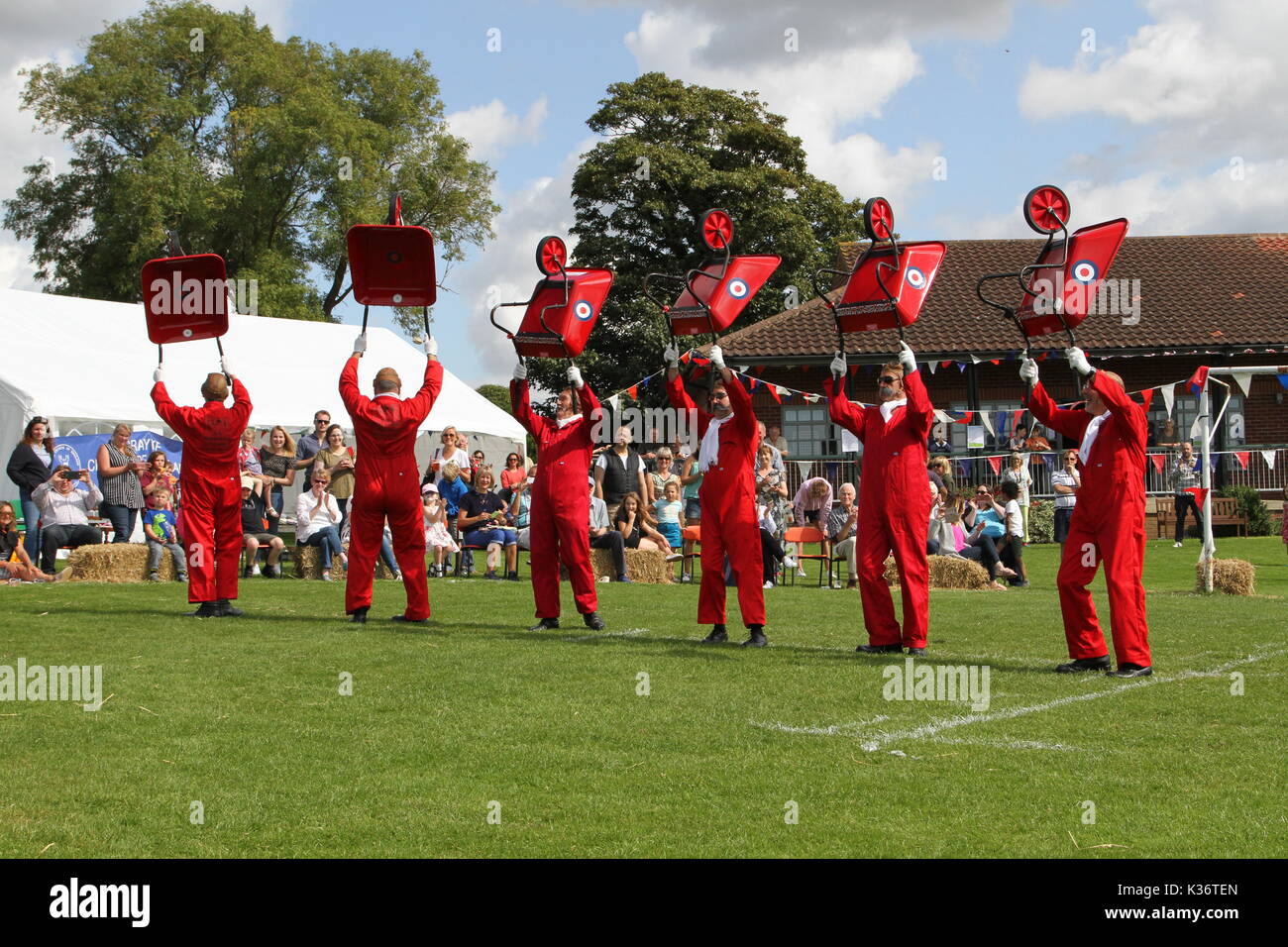 Red and blue uniforms hi-res stock photography and images - Alamy