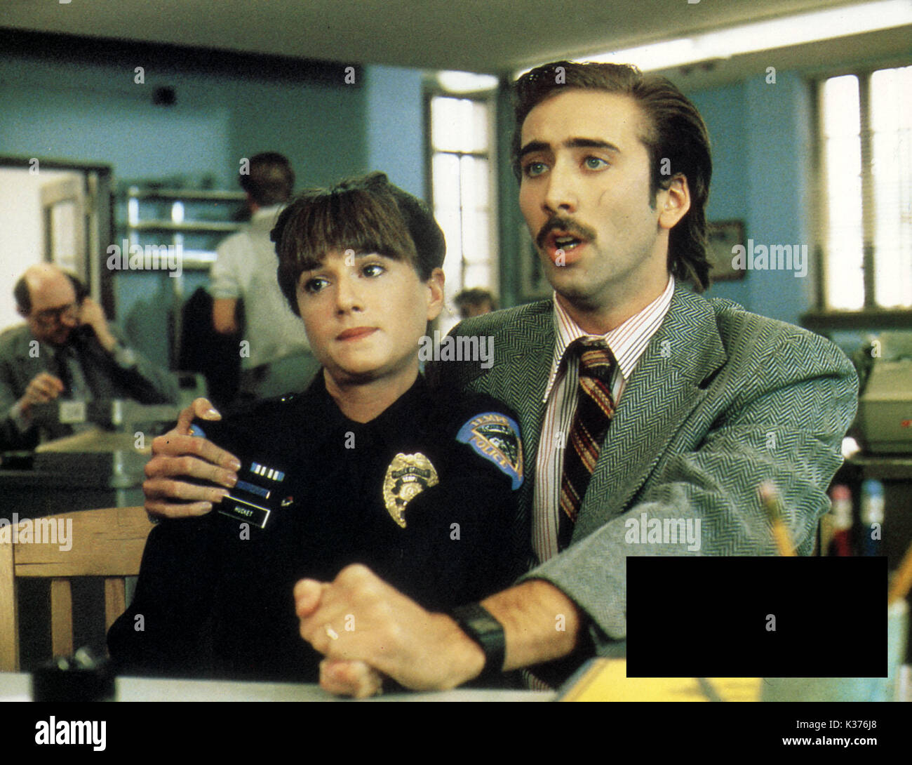 RAISING ARIZONA HOLLY HUNTER AND NICHOLAS CAGE Date: 1987 Stock Photo ...