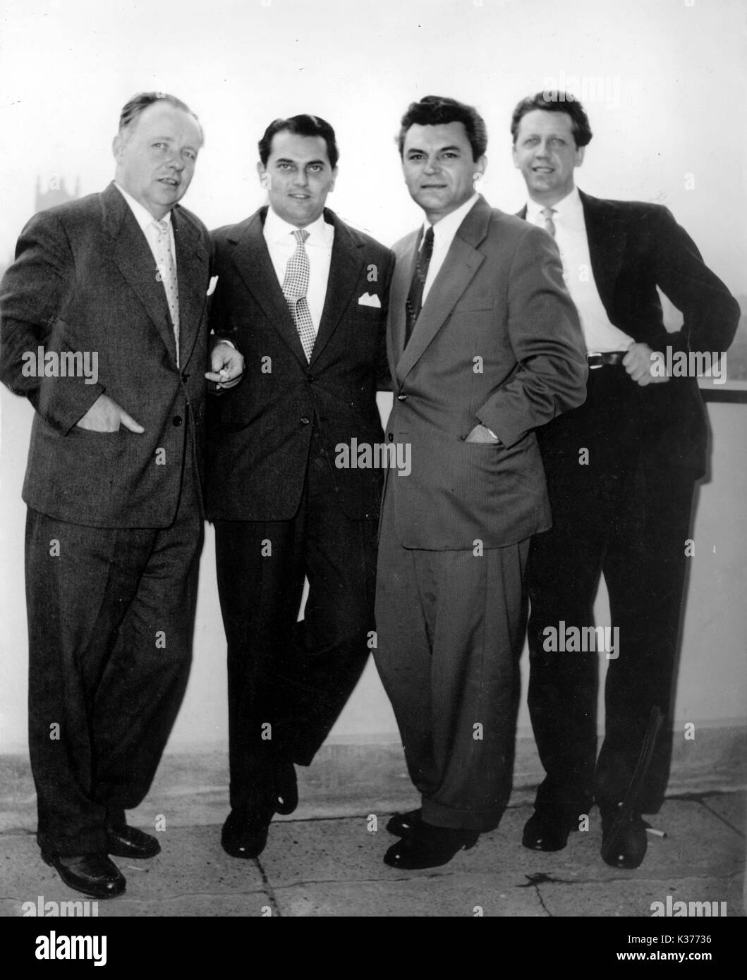 KENNETH RIVE Managing Director of Gala Films with three unidentified ...