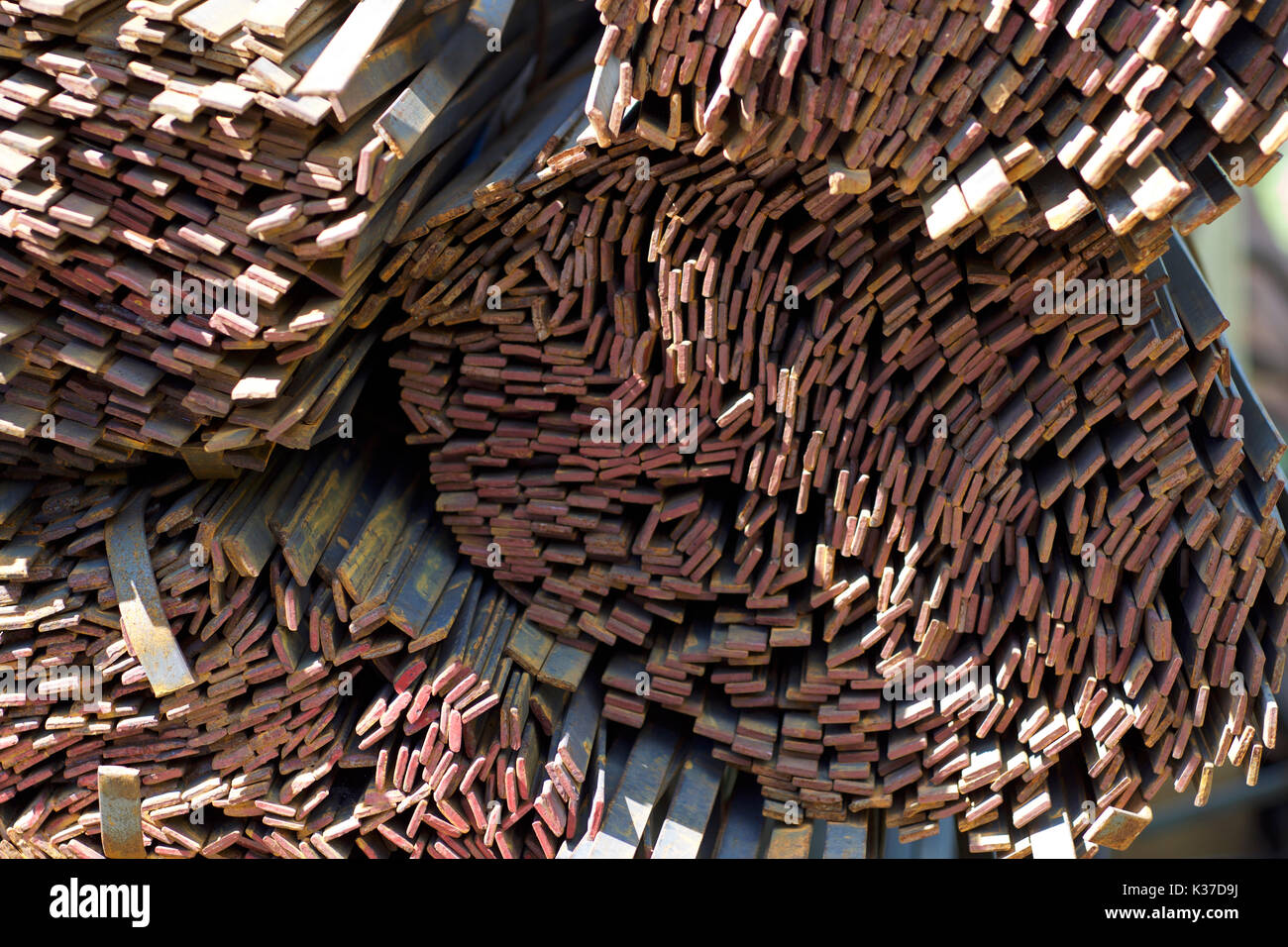 Metal profile strip in packs at the warehouse of metal products, Russia ...