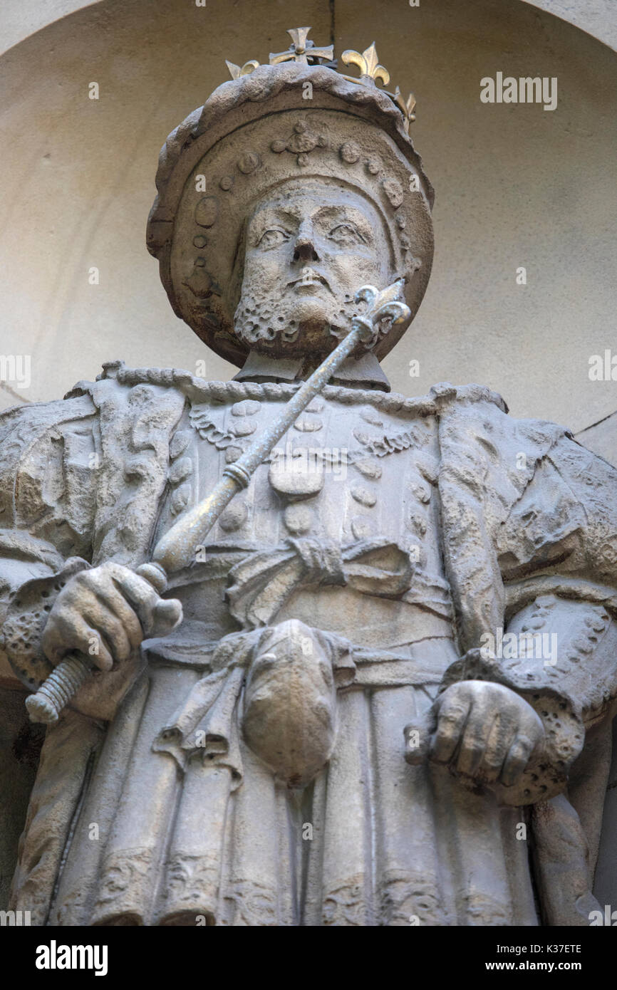 A statue of King Henry VIII located above the Henry VIII Gate at St ...