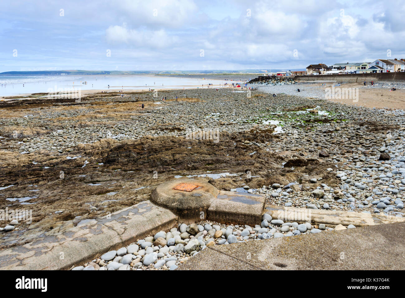 Victorian pipe on rocky beach at Westward Ho!, Devon, England, UK Stock ...