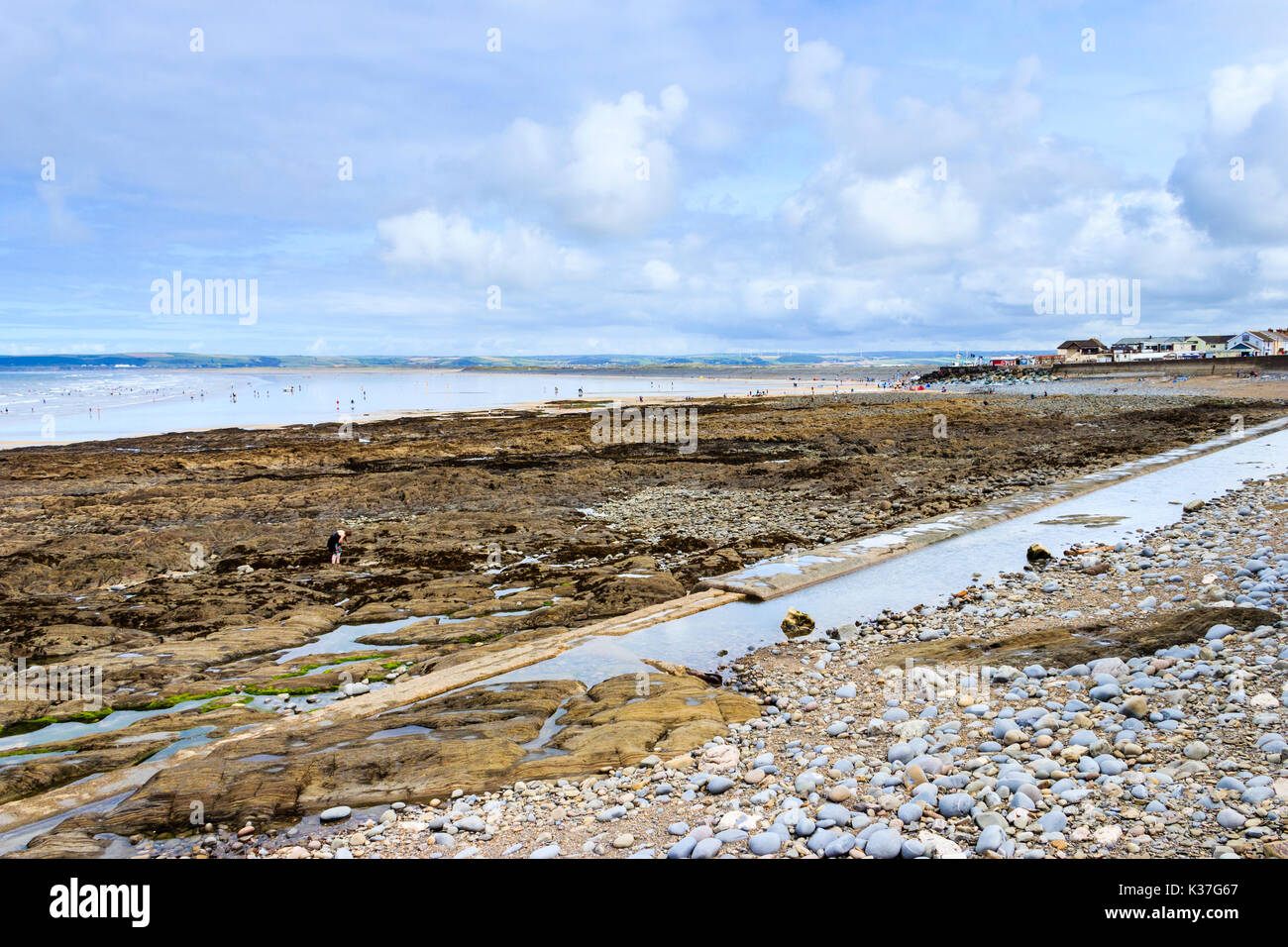 Victorian pipe on rocky beach at Westward Ho, Devon, England, UK Stock ...