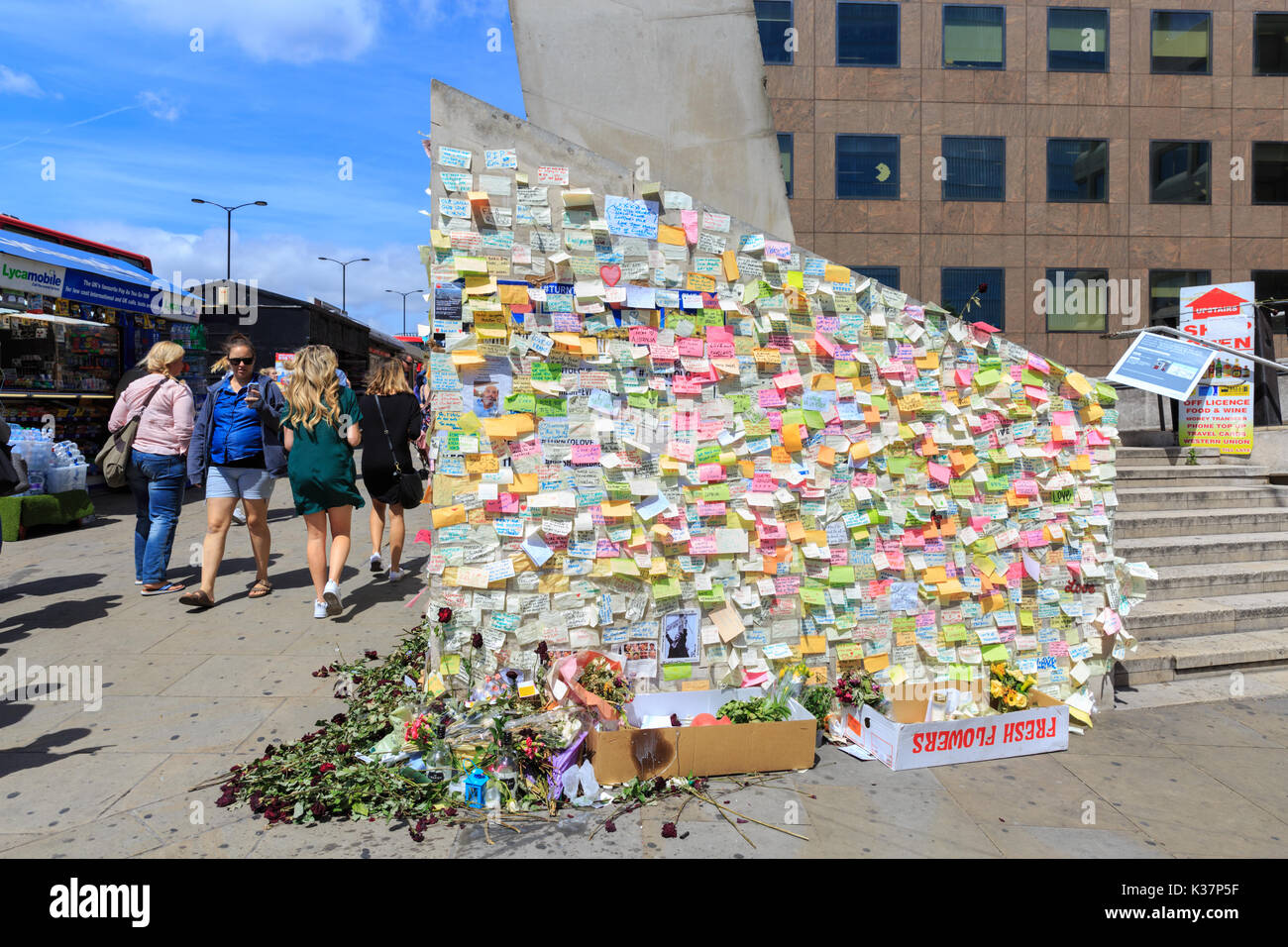 Wall of condolence cards, notes, tributes and flowers at vigil near the ...