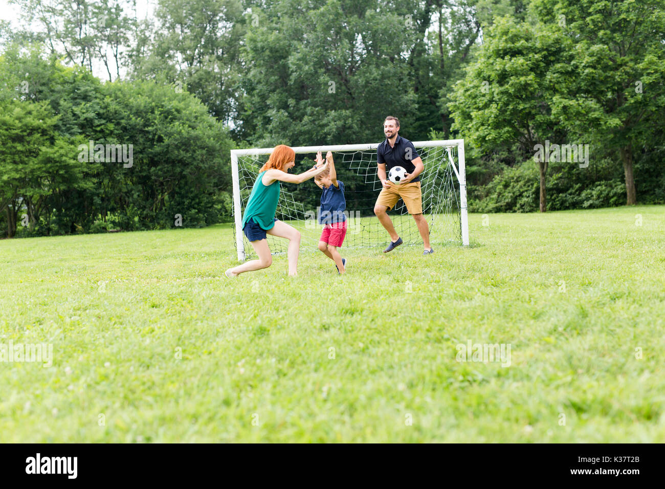 Park football summer men hi-res stock photography and images - Alamy