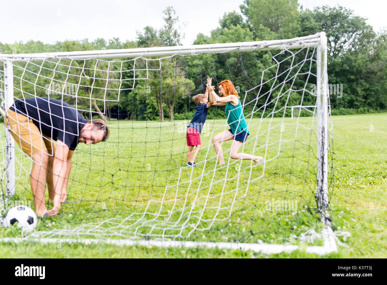 Park football summer men hi-res stock photography and images - Alamy