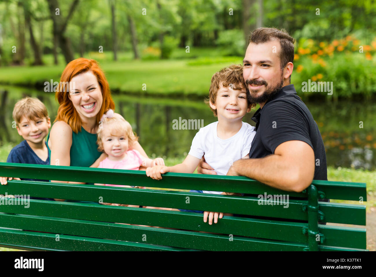 Daughter mom sitting on bench hi-res stock photography and images - Alamy