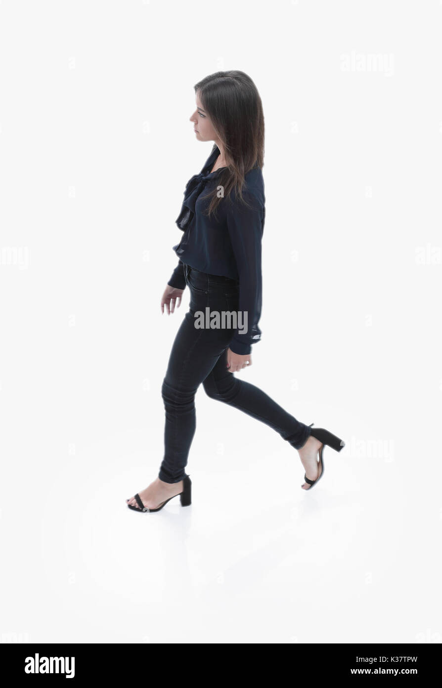 modern young business woman confidently moving forward. photo in full ...